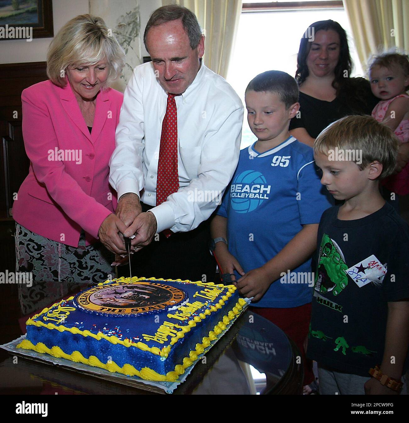 Idaho Gov. Jim Risch, with his wife Vicki, cut Idaho's 116th birthday ...