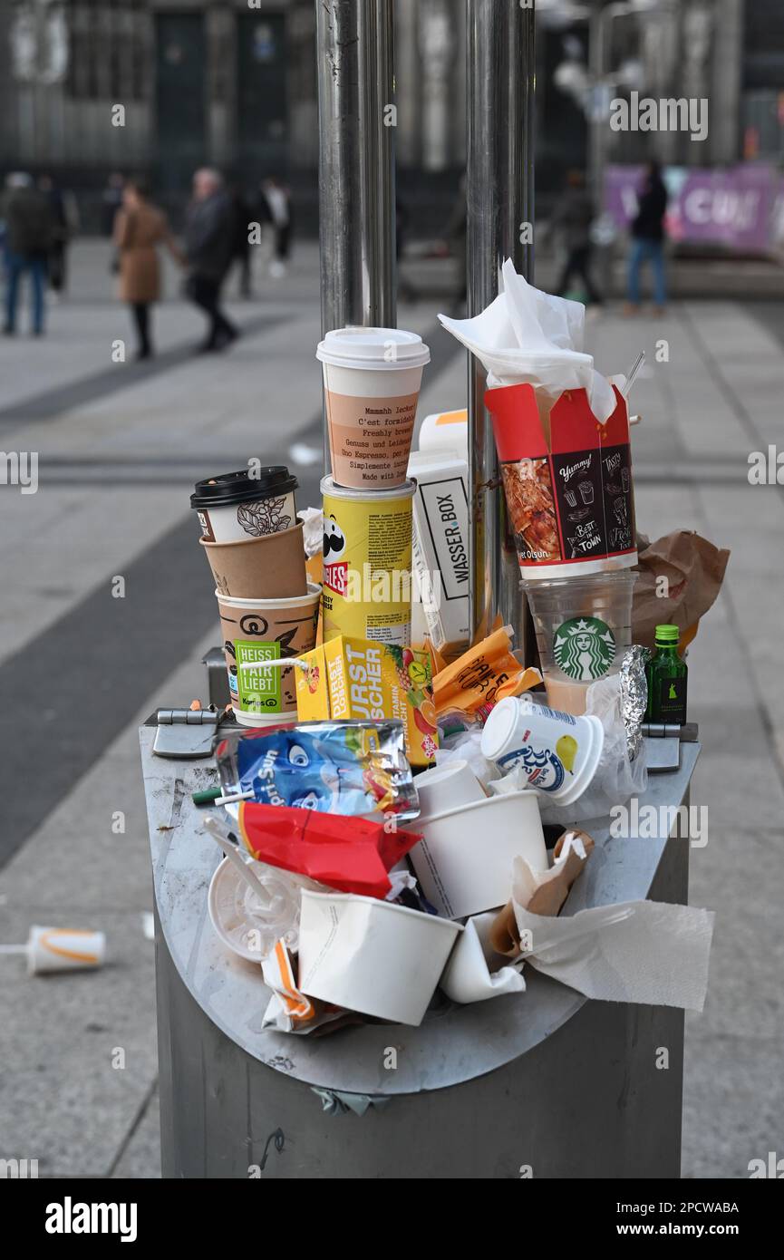 Cologne, Germany. 11th Mar, 2023. A full public trash can, trash cans ...