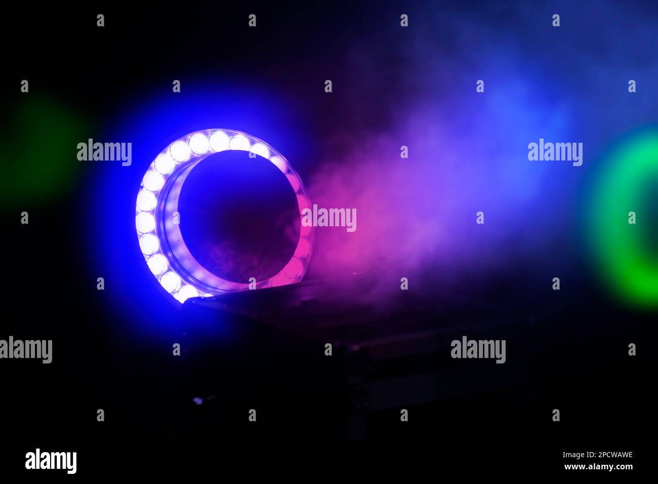Background stage colored smoke and light from spotlight on dark blue ...