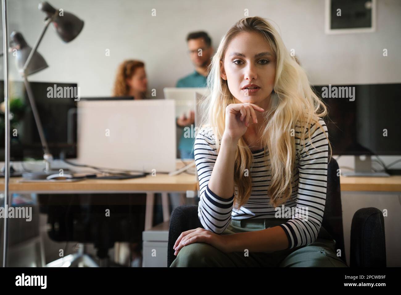 Portrait of attractive skilled experienced girl database editor at ...