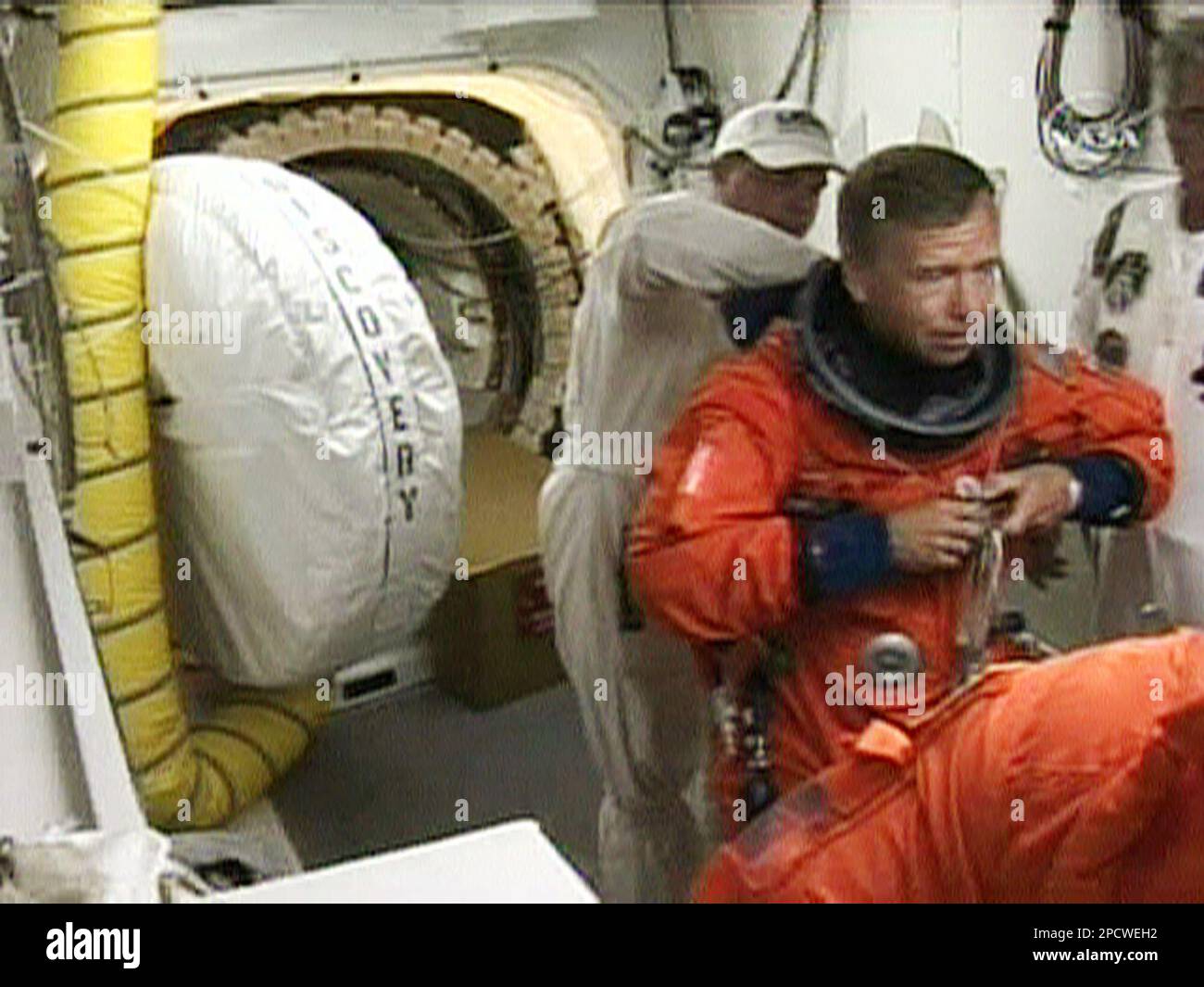 In this image made from TV, STS-121 Commander Steve Lindsey adjusts a ...