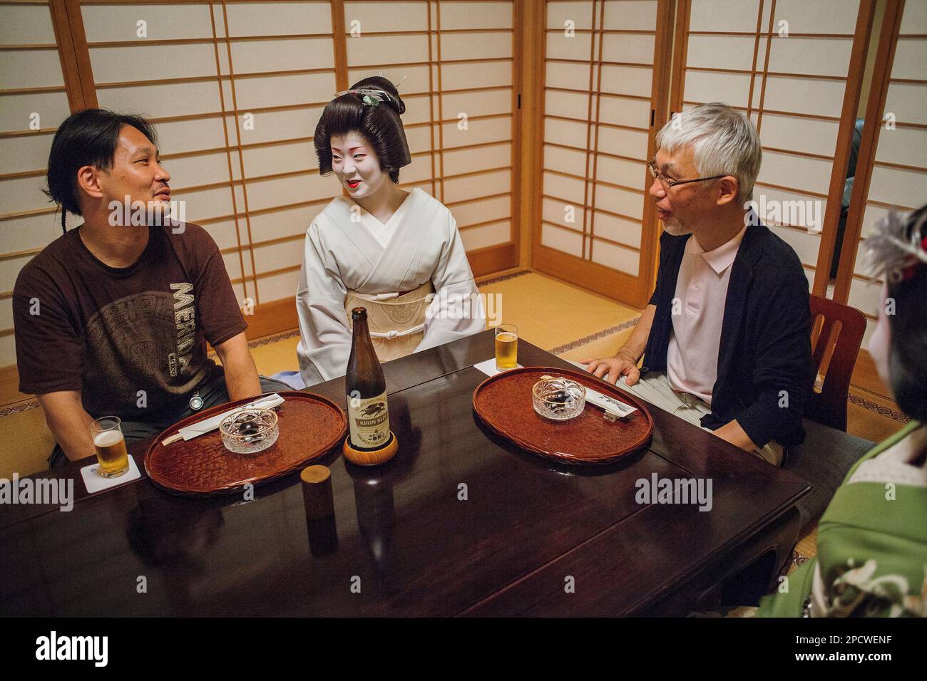 Fukuyu,geisha workimg in Miyaki tea house (o-chaia).Geisha's distric of ...