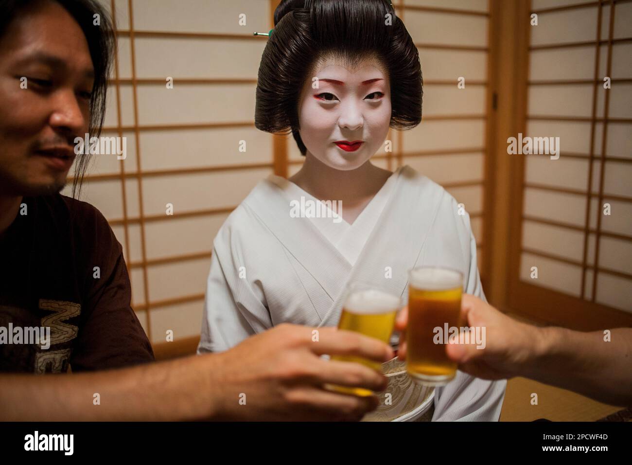 Fukuyu,geisha workimg in Miyaki tea house (o-chaia).Geisha's distric of ...