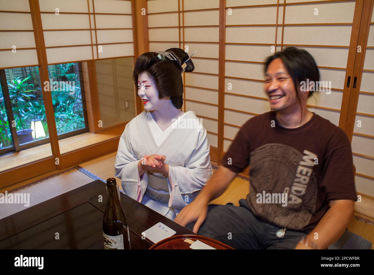 Fukuyu,geisha workimg in Miyaki tea house (o-chaia).Geisha's distric of ...