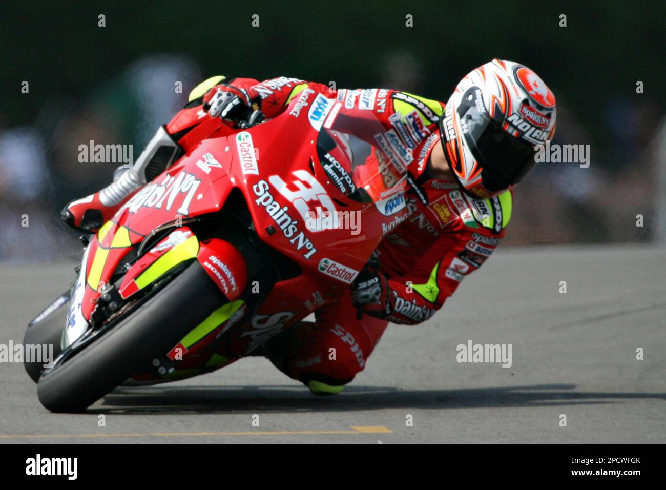 Fortuna Honda MotoGP Team Italian rider Marco Melandri takes a corner ...