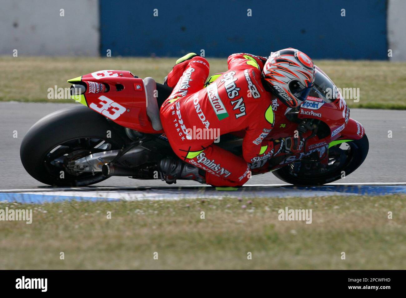 Fortuna Honda MotoGP Team Italian rider Marco Melandri takes a corner ...