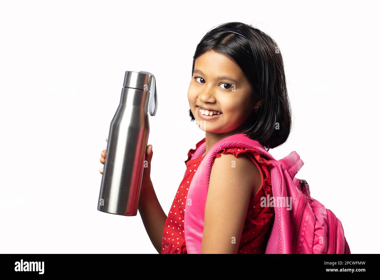 Indian school girl drinking water hi-res stock photography and images - Alamy