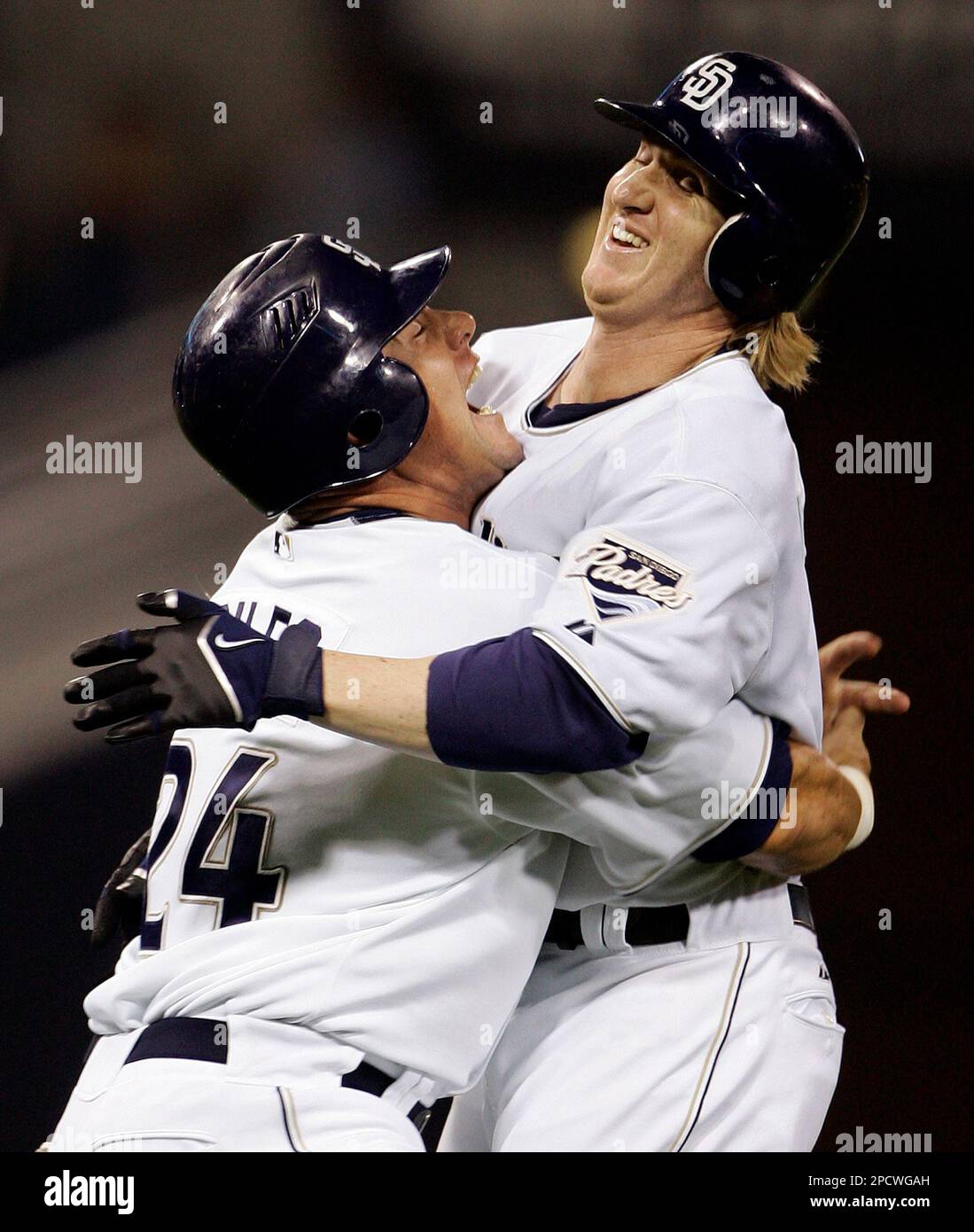 San Diego Padres' Brian Giles lifts teammate Khalil Greene after Greene ...