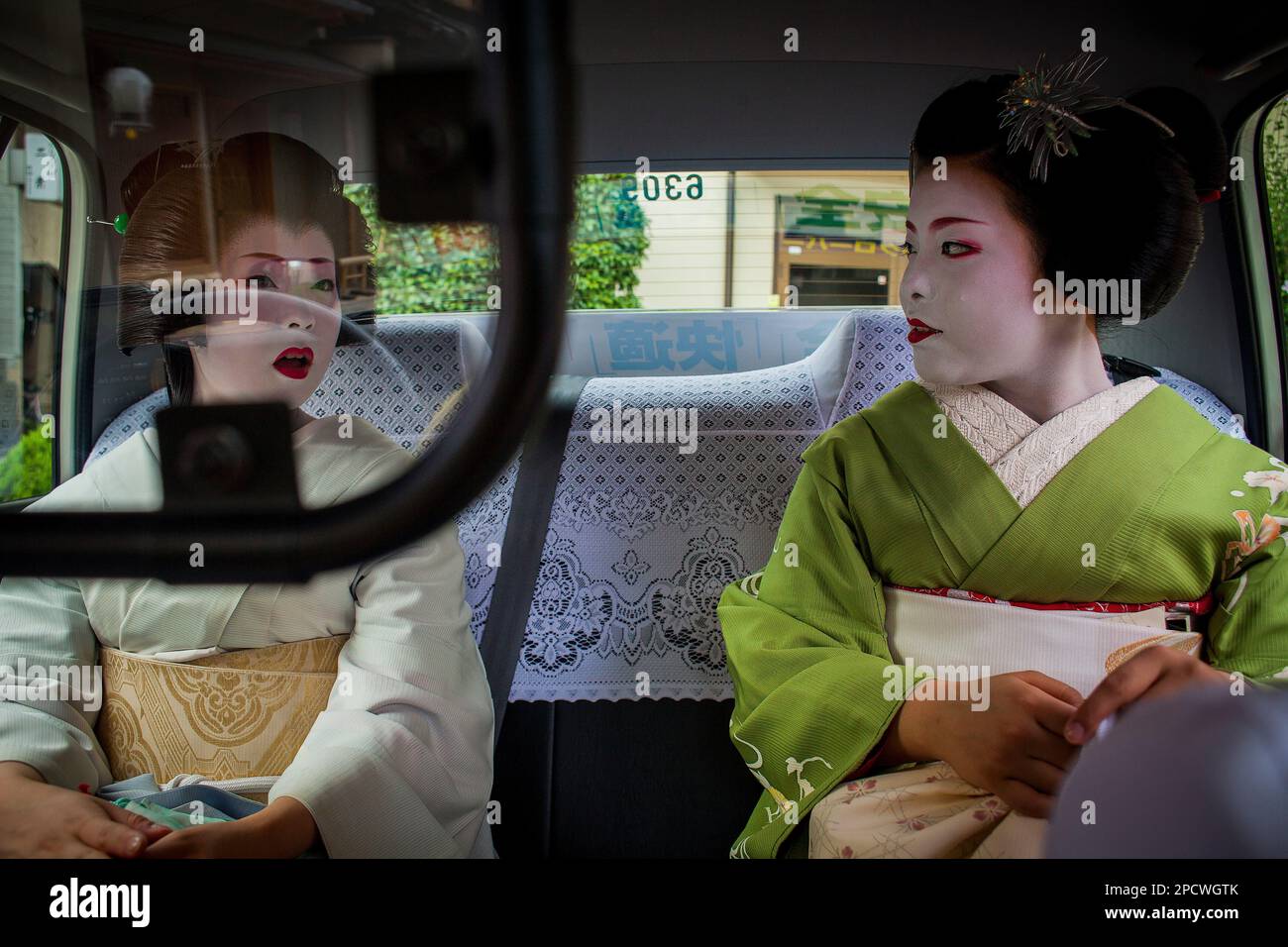 Fukuyu,geisha and Fukukimi,'maiko' (geisha apprentice)in taxi going to ...