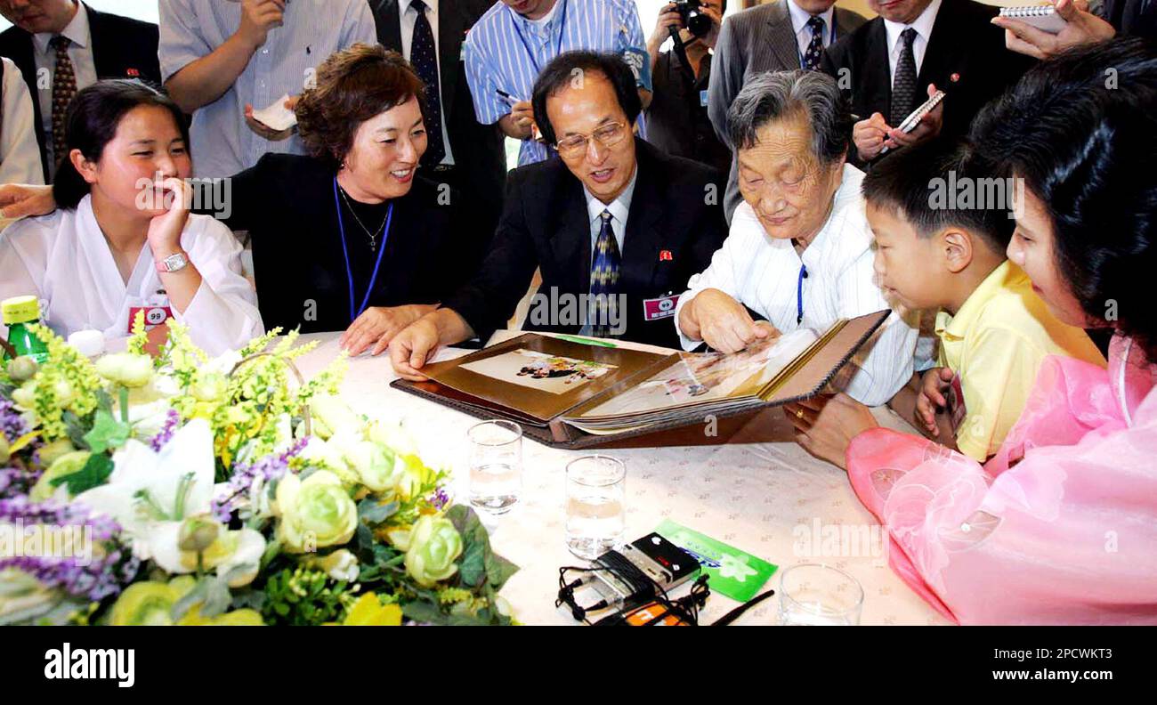 Kim Young Nam, third from left, his son Kim Chol Bong, second from ...