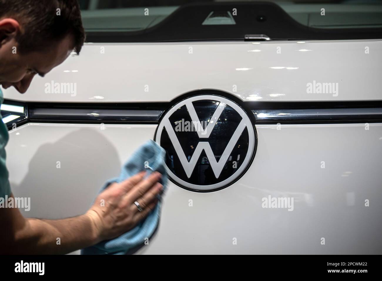 Berlin, Germany. 14th Mar, 2023. A VW logo on an I.D. Buzz is polished ...