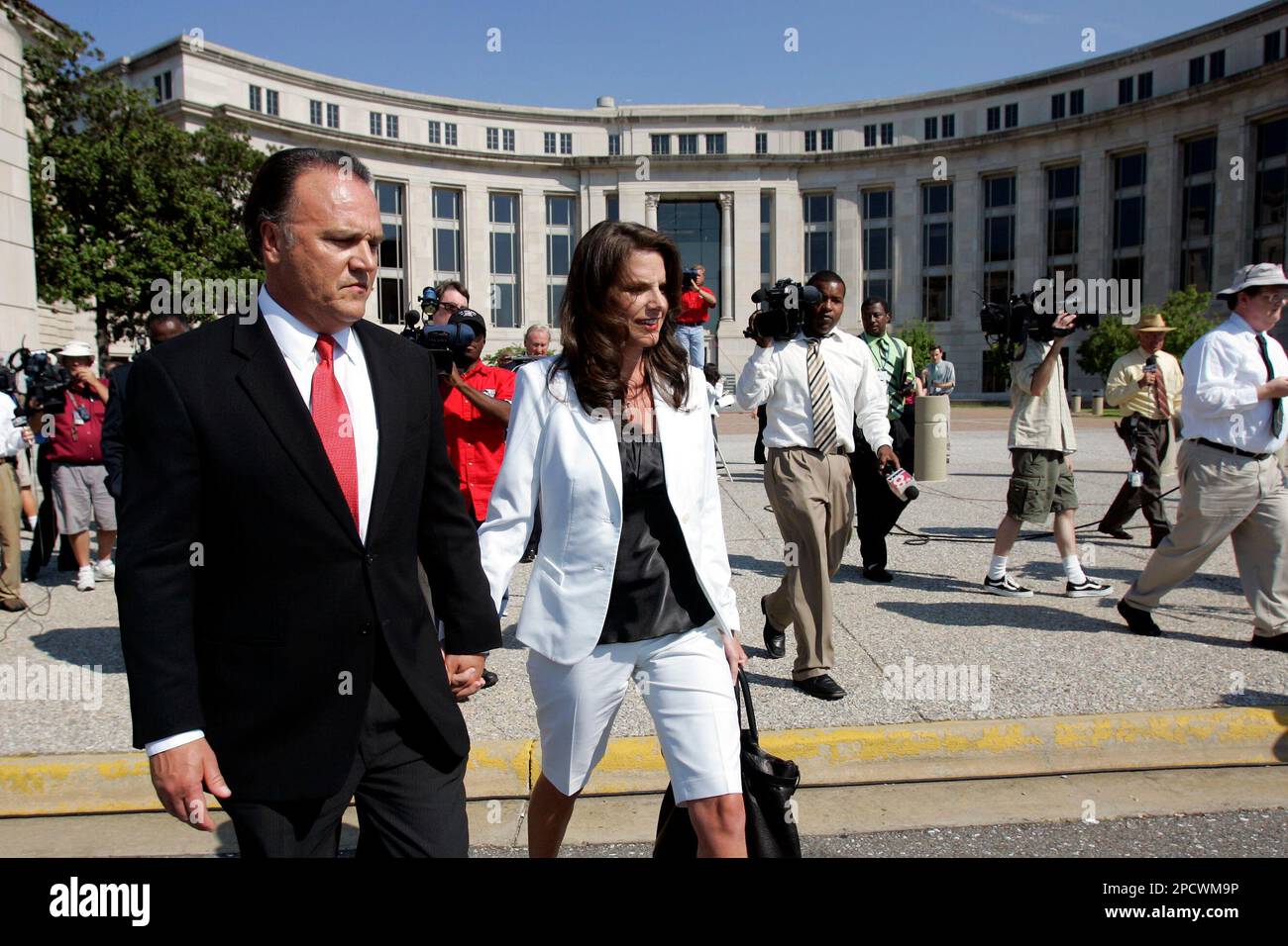Former HealthSouth CEO Richard Scrushy and his wife, Leslie, leave the ...