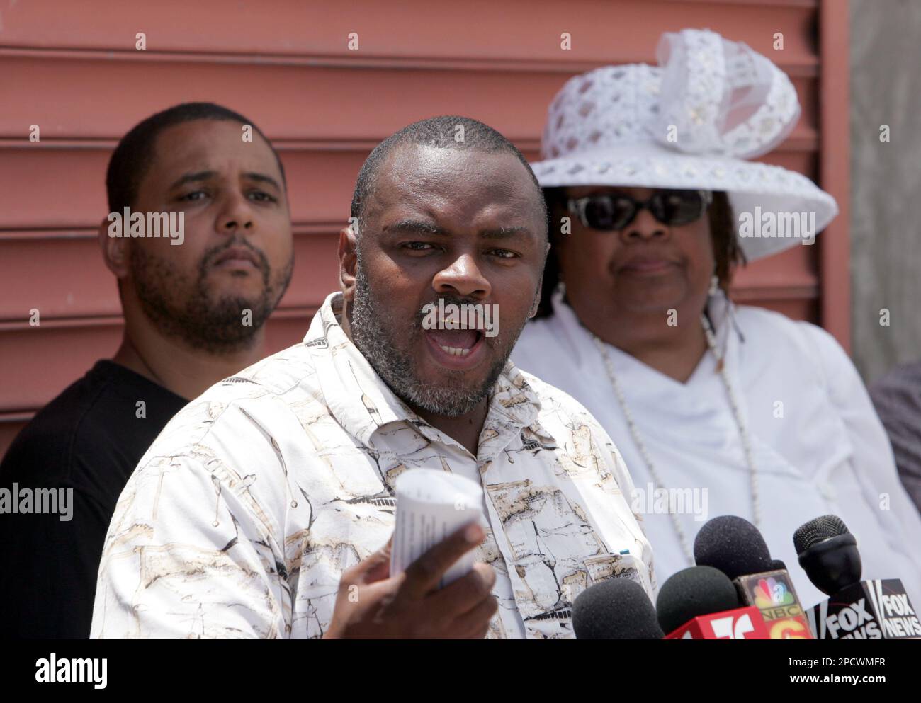 Leroy Jones, a concerned citizen, center, speaks as Max Rameau, left ...
