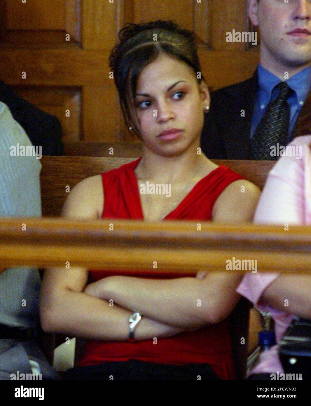 Shooting victim Lissette Cumba, 15, of Lowel, Mass., listen as closing ...