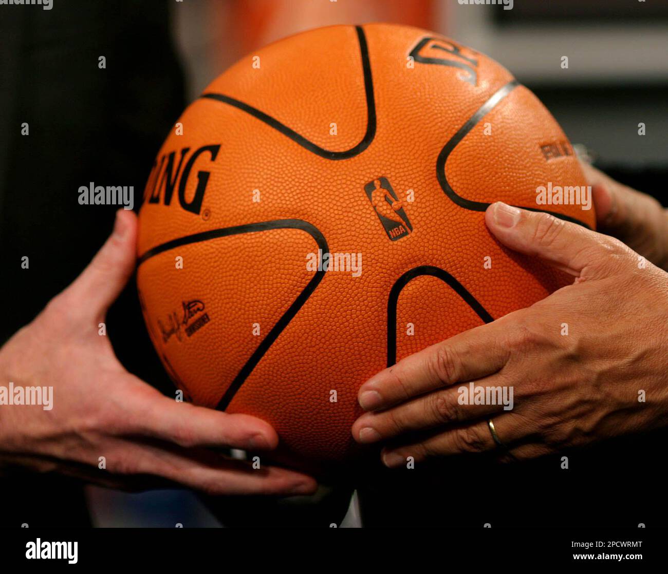 A side view of the new official NBA game basketball is displayed at the ...