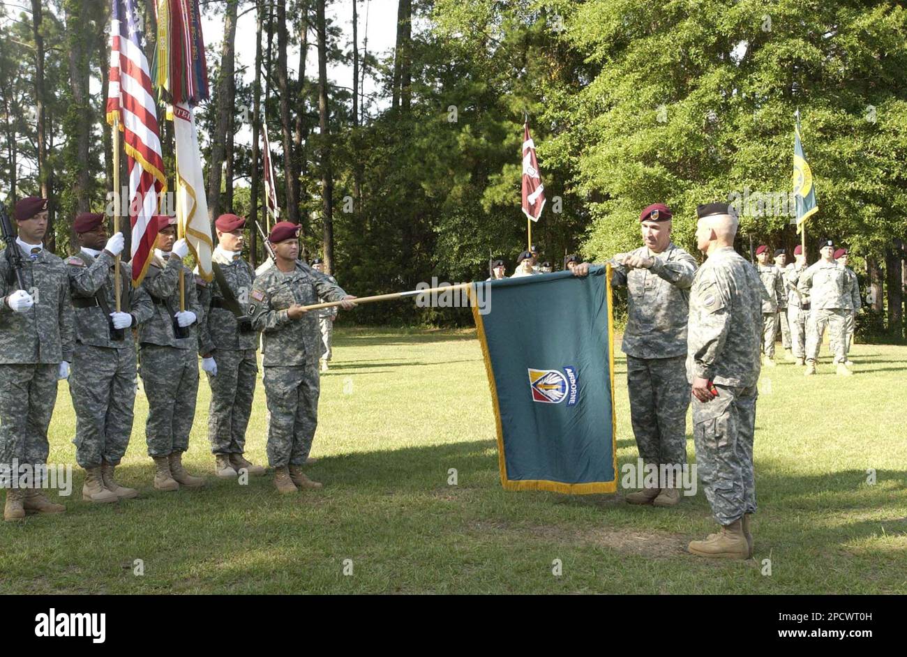 Brigadier Gen, Michael Barbero, center, outgoing commander of Fort Polk ...