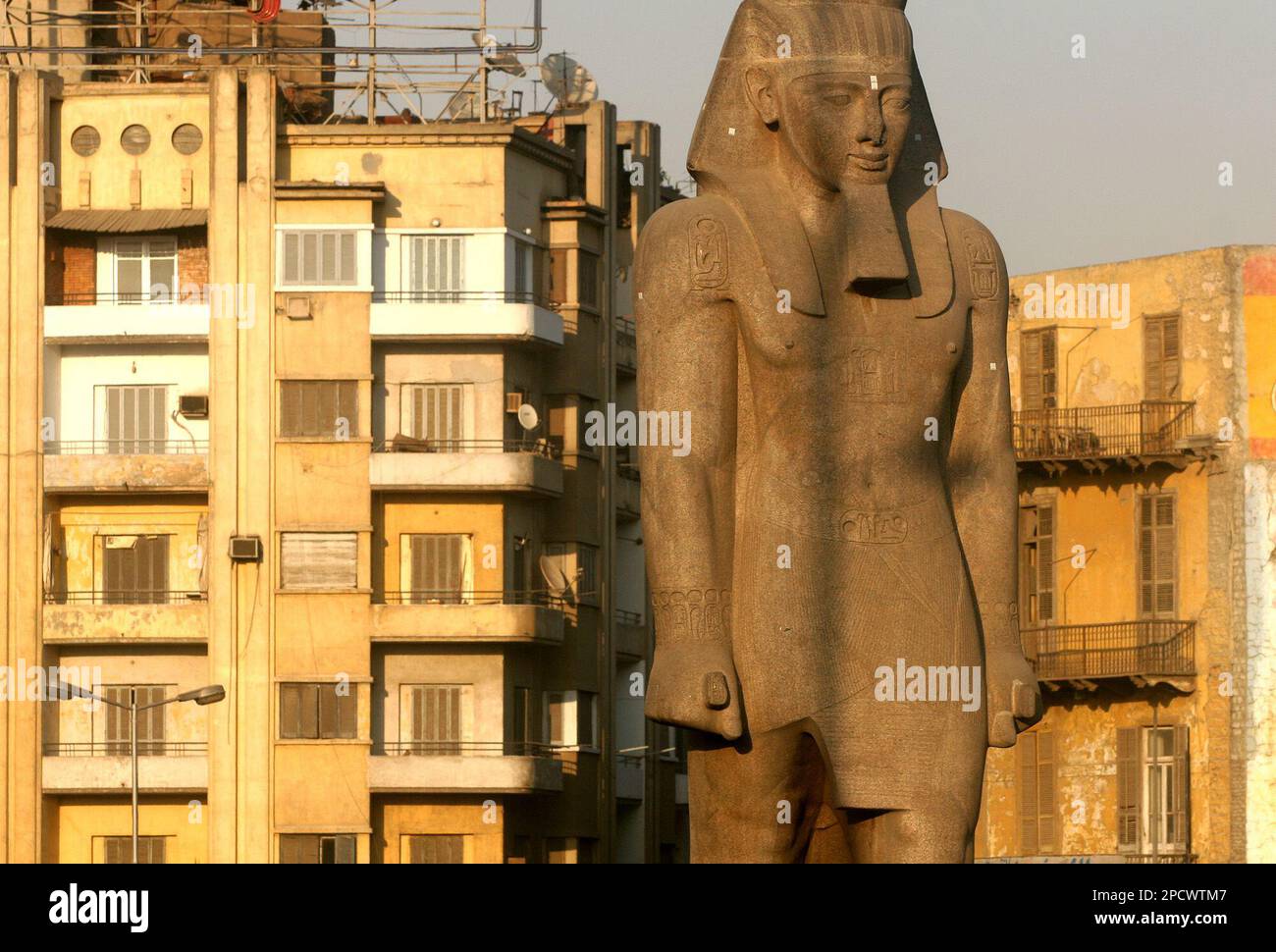 The 19th Dynasty Pharaoh Ramses II statue, suffering from the ravages ...