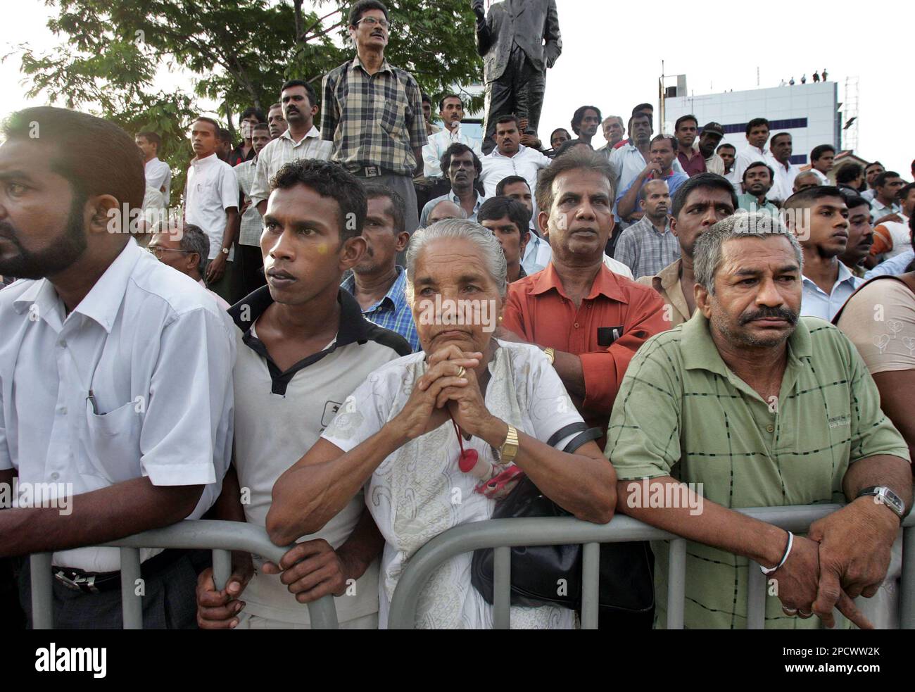 People look on during the funeral ceremony of Sri Lankan army Maj. Gen ...