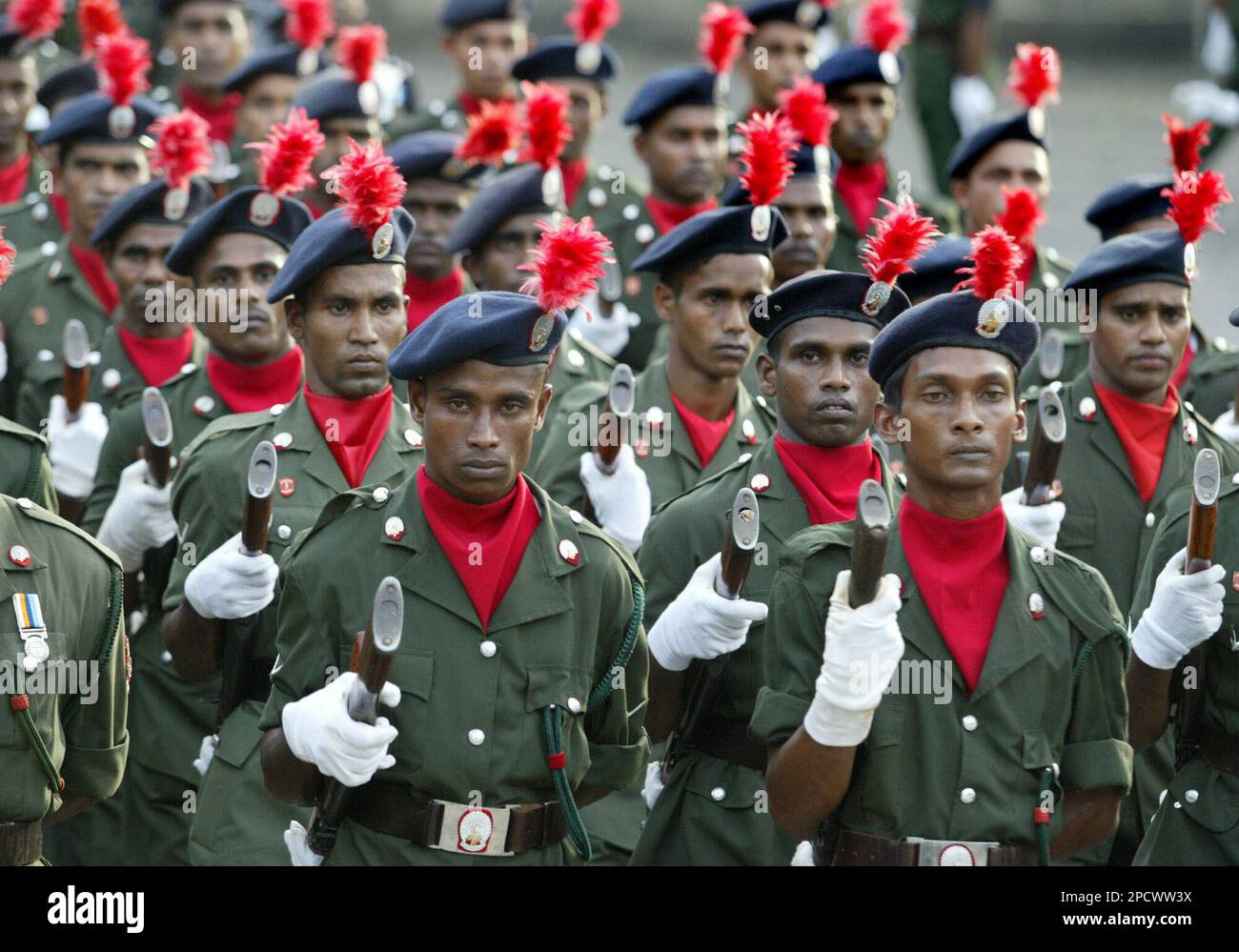 Sri Lankan army soldiers march during the funeral of Maj. Gen Parami ...