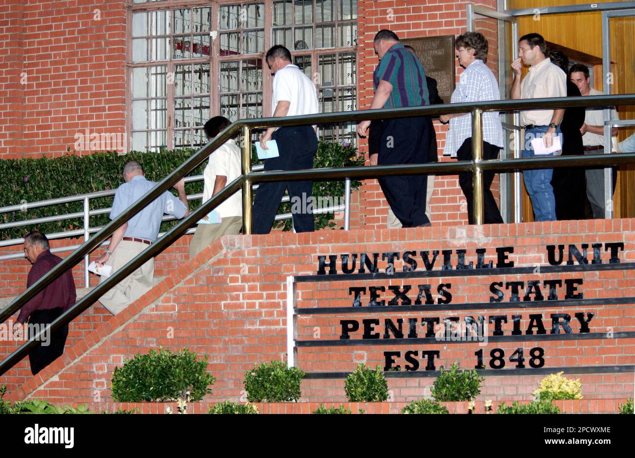 Family members of victims walk out of the Walls Unit following the ...