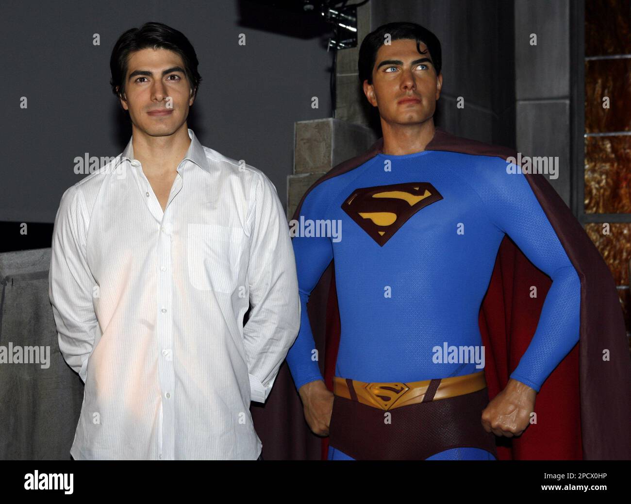 Brandon Routh, left, star of "Superman Returns," poses with a wax ...