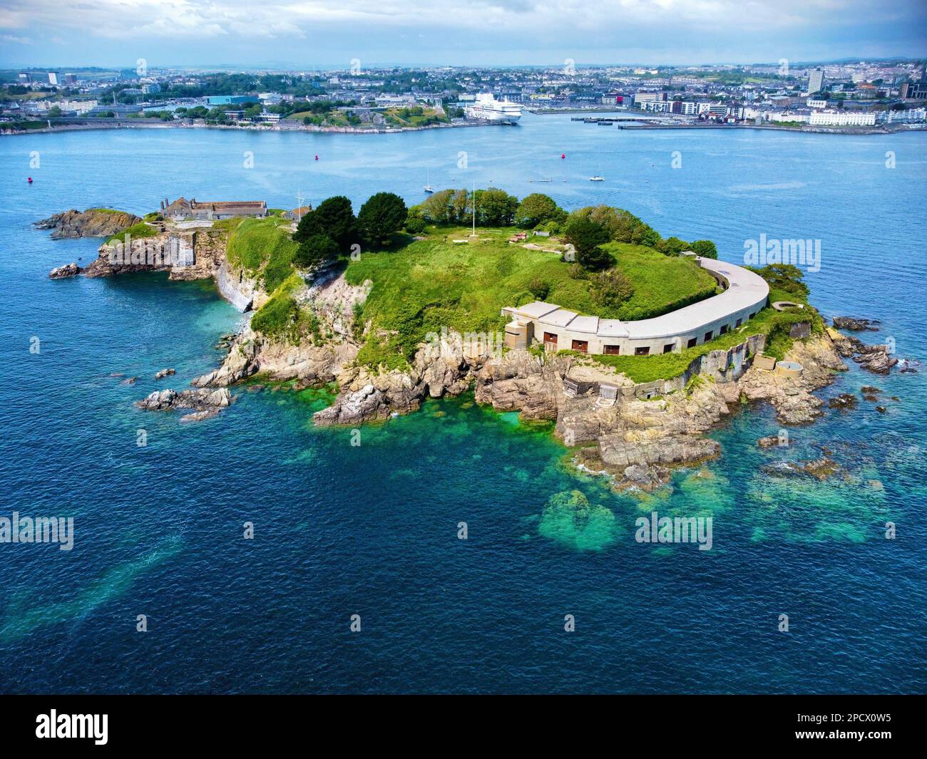 An Aerial view of Drake's Island in Plymouth UK, blue sky with white ...