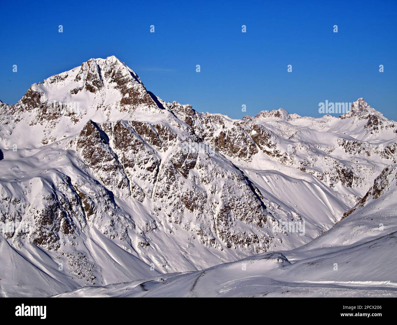 This stunning landscape showcases a snow-covered mountain range with ...