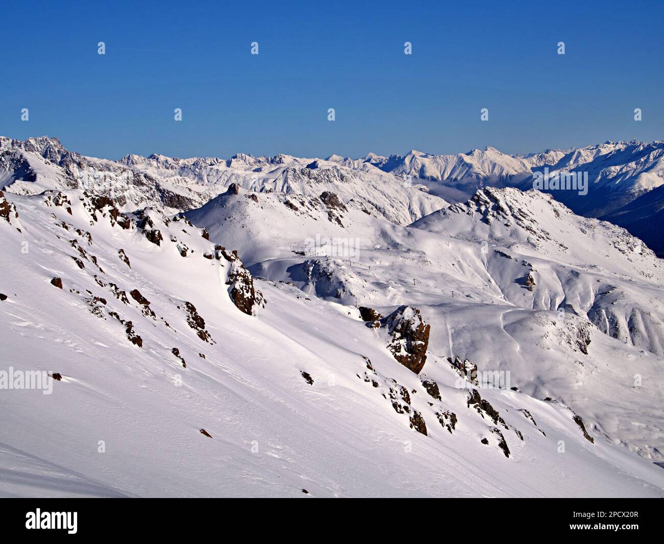 Spectacular snowy mountain range with breathtaking views Stock Photo ...