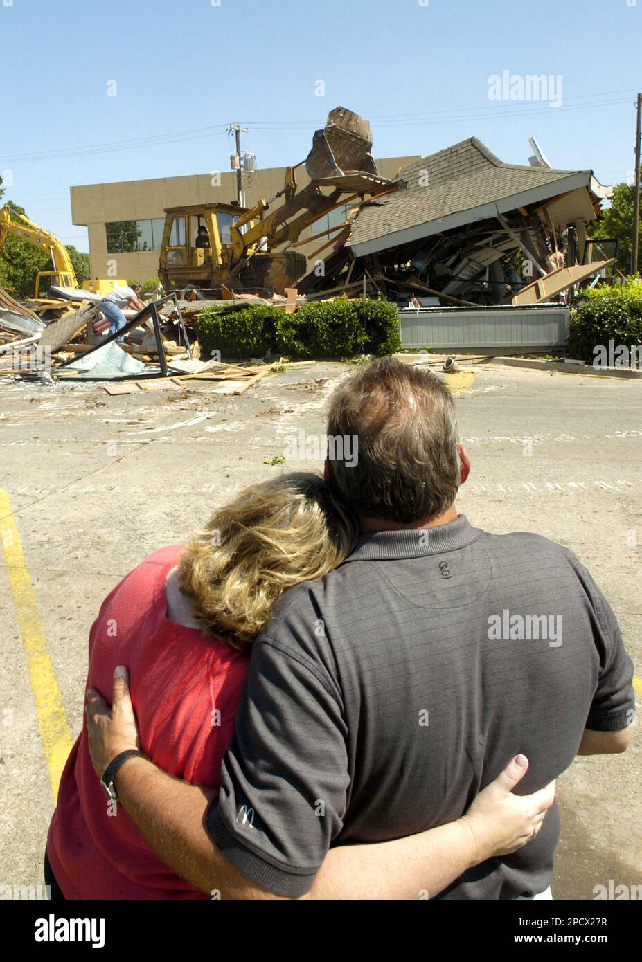Steve Bittle, owner of the McDonald's in Enid, Okla., watches with his ...