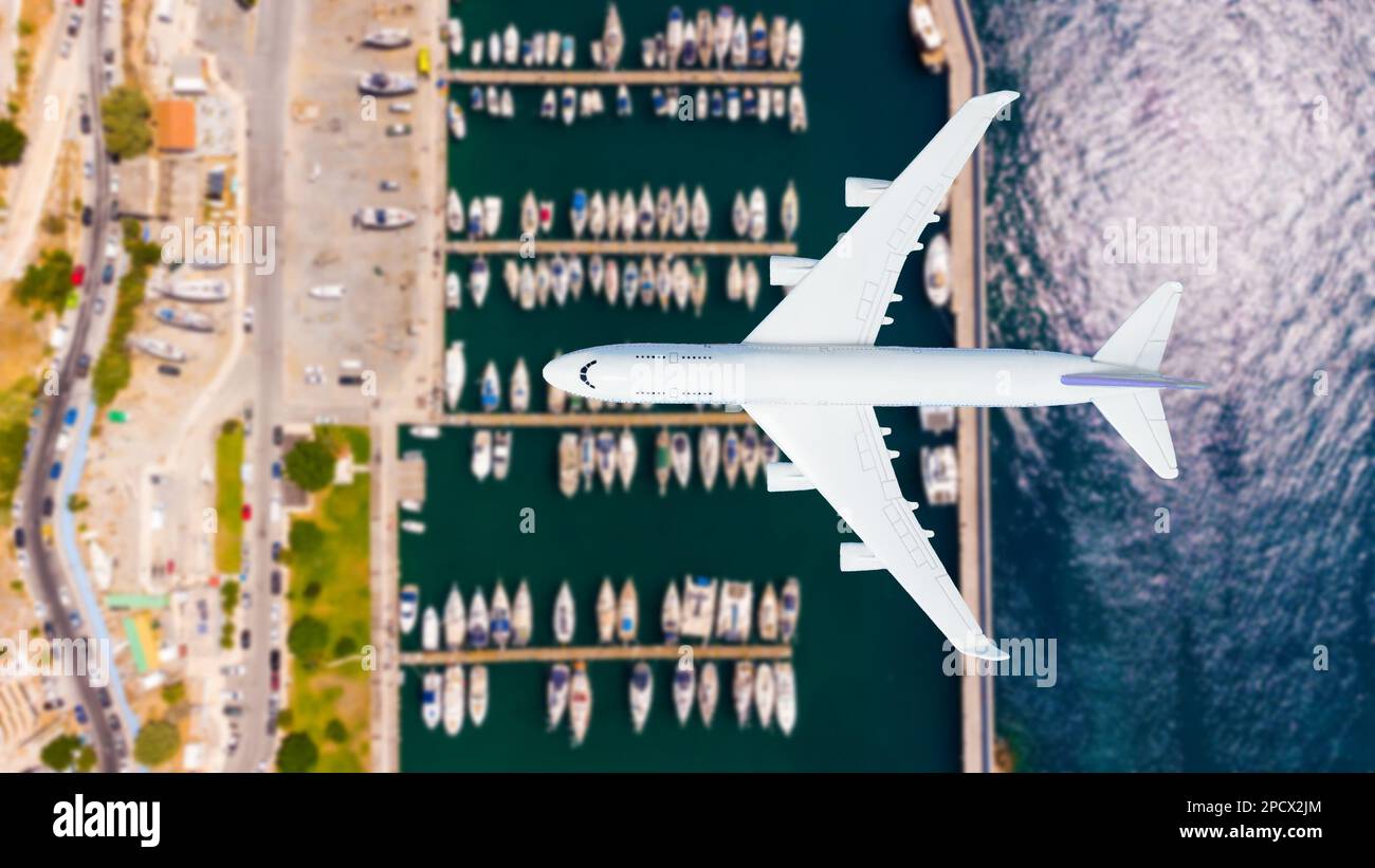 plane above the ground. Aerial city view Stock Photo - Alamy