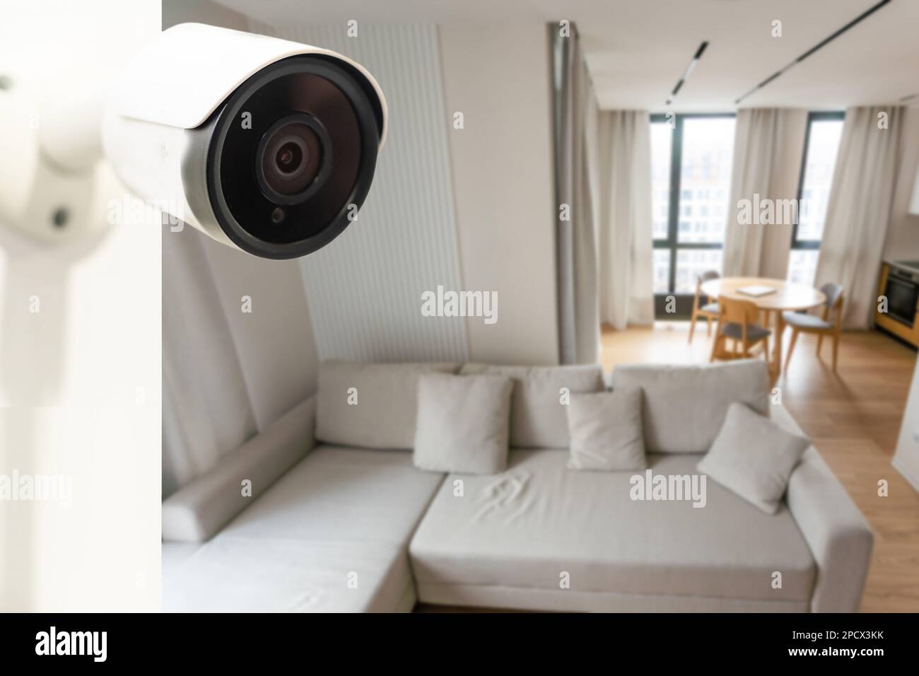 Modern CCTV camera installed in entryway of apartment building Stock ...