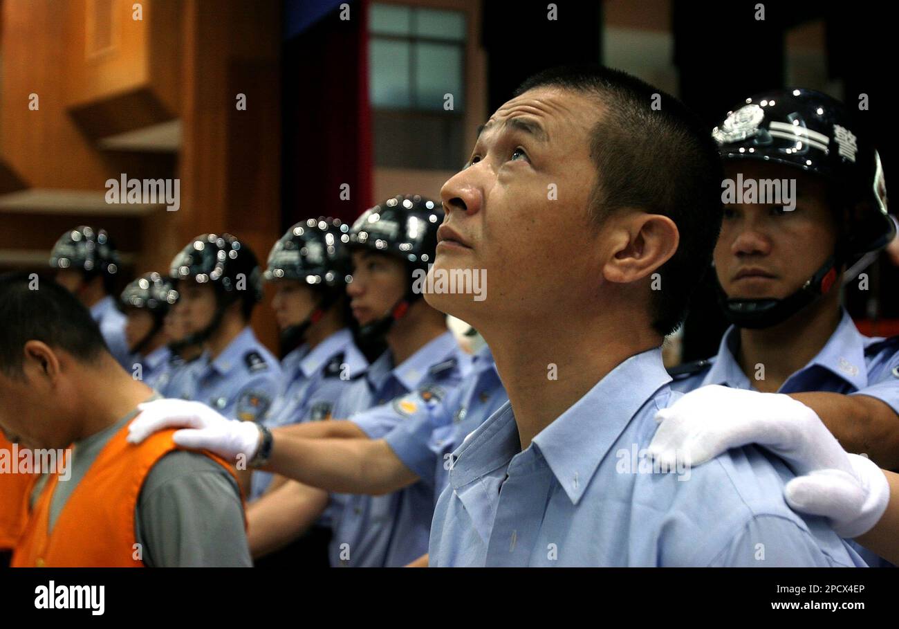 Yang Ruishen reacts after hearing his death sentence at the Nanning ...