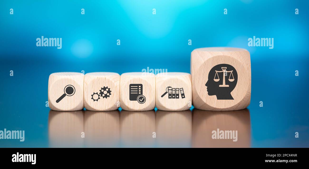 Wooden blocks with symbol of assessment concept on blue background ...