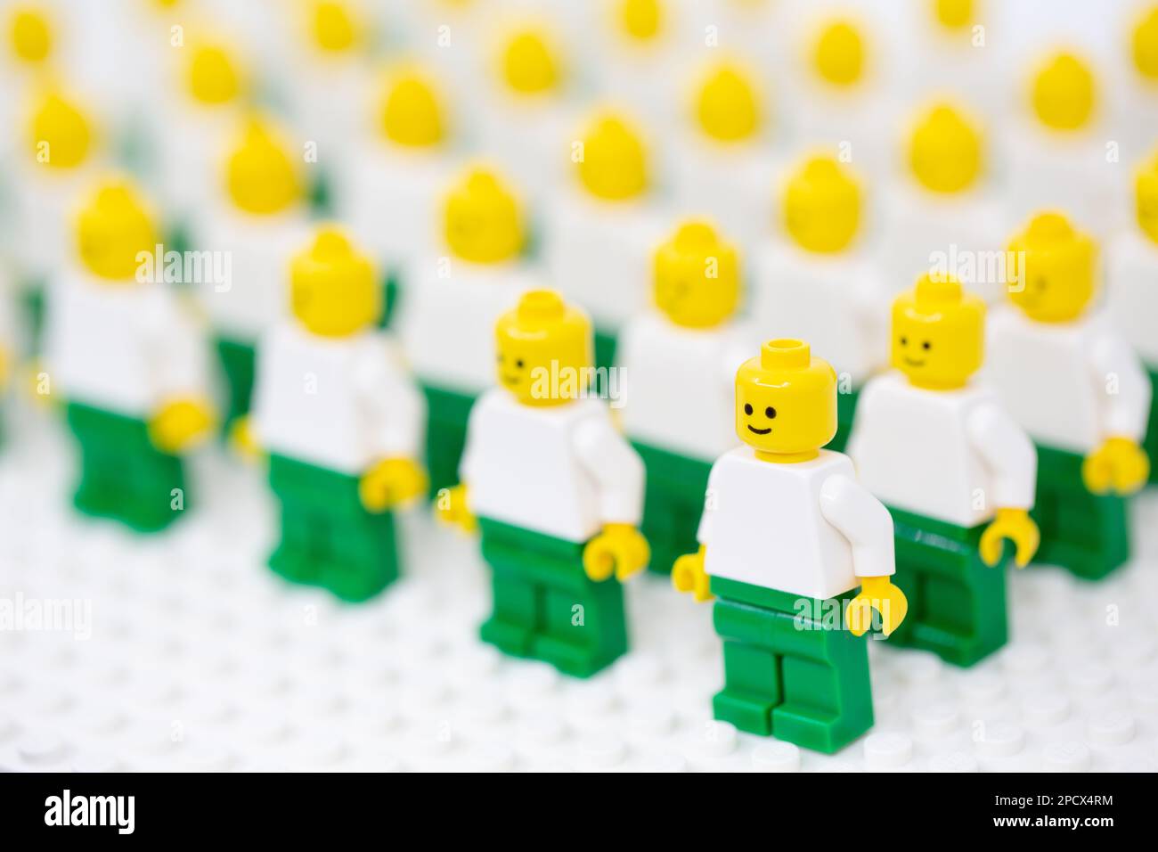 crowd of people stand together with bald head show the strong feeling ...