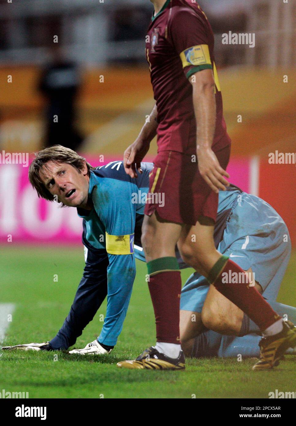Dutch goalkeeper Edwin van der Sar kneels on the pitch after The ...