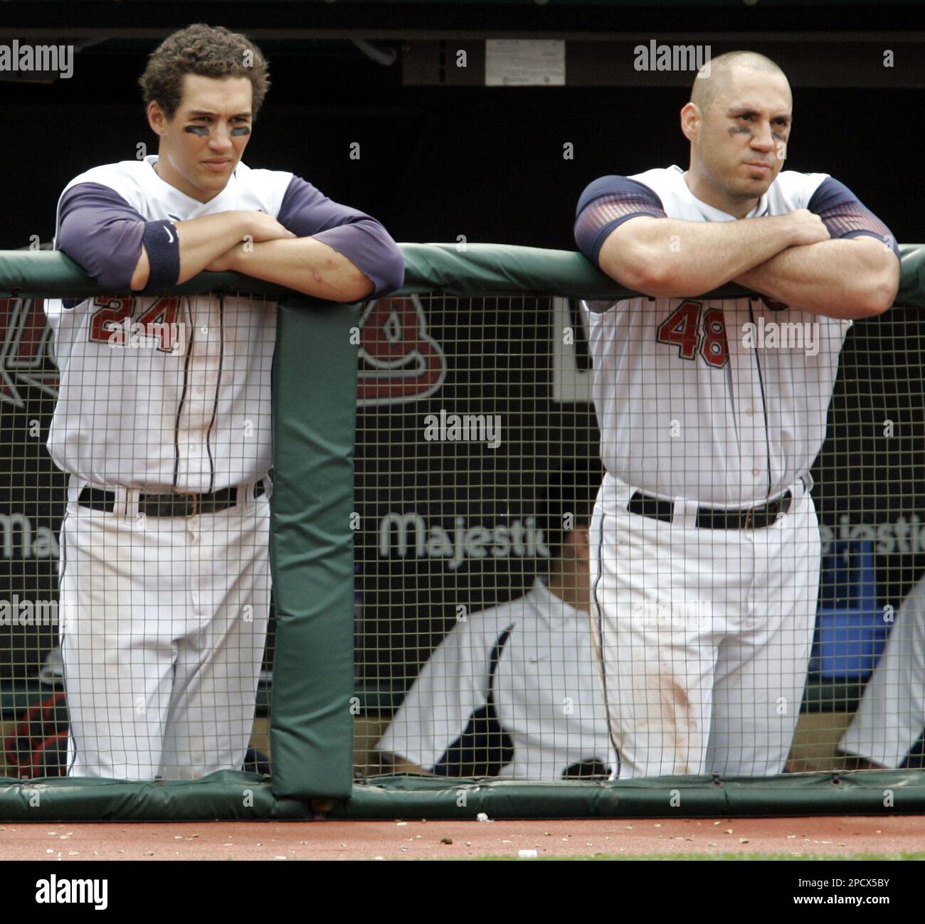 Cleveland Indians' Grady Sizemore, left, and Travis Hafner watch from ...