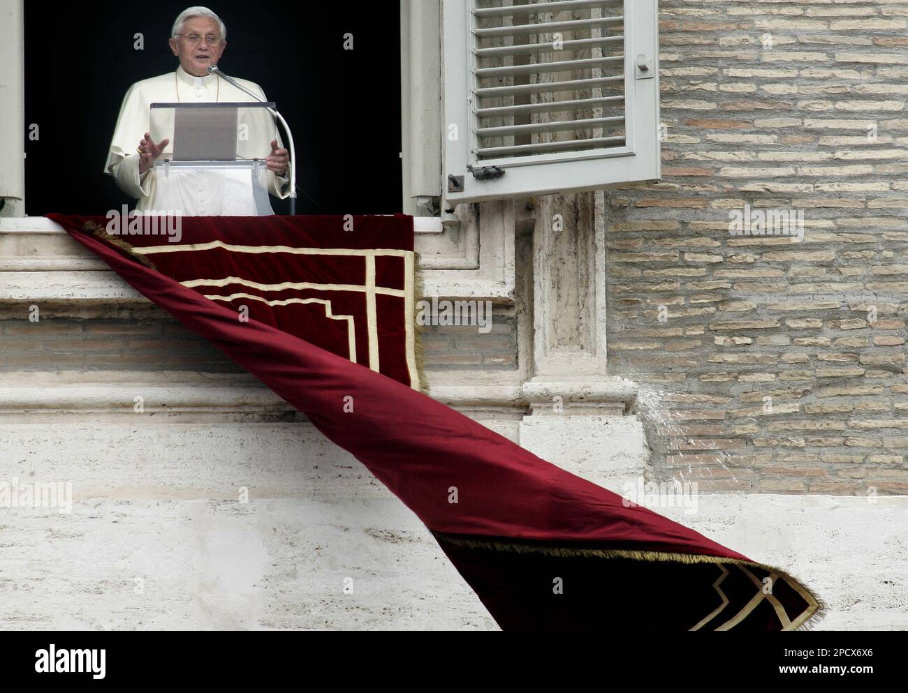 Pope Benedict XVI delivers his address during the Angelus prayer as the ...