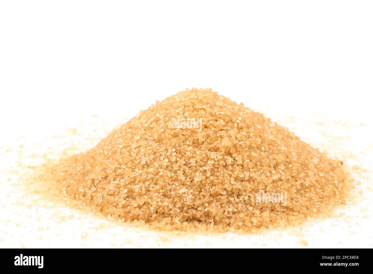Crystals cane brown sugar isolated on white background Stock Photo - Alamy