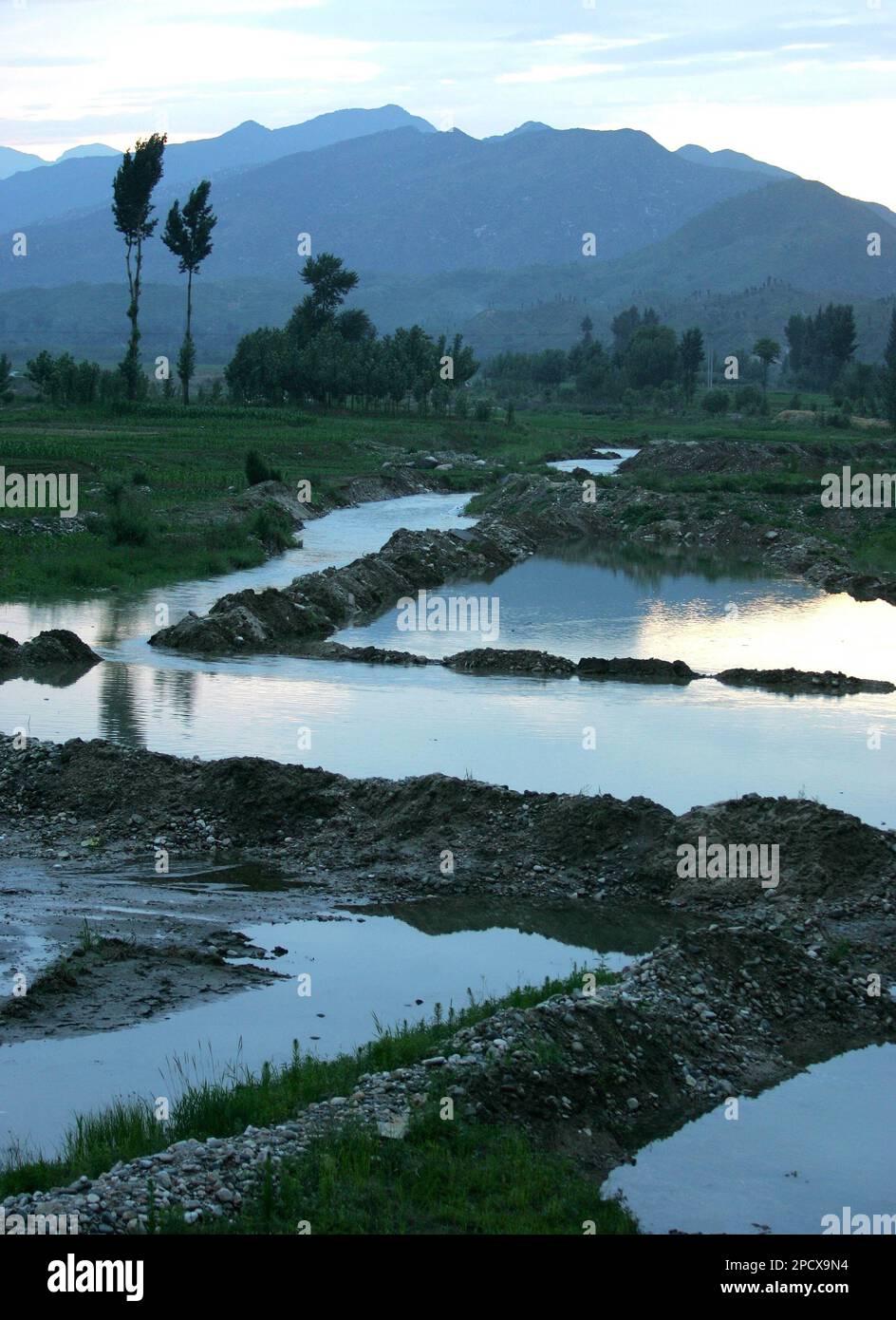 Water from the Dasha river pools after makeshift dams were created to ...