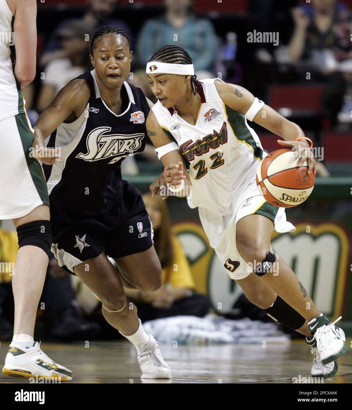 San Antonio Silver Star's Vickie Johnson, left, defends as Seattle ...