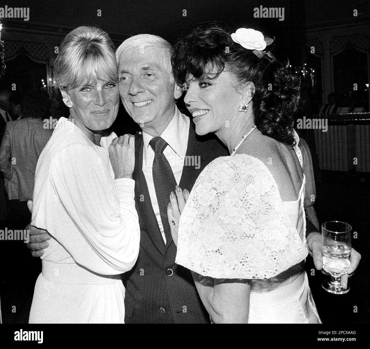 **FILE**Television producer-director Aaron Spelling, center, poses with ...