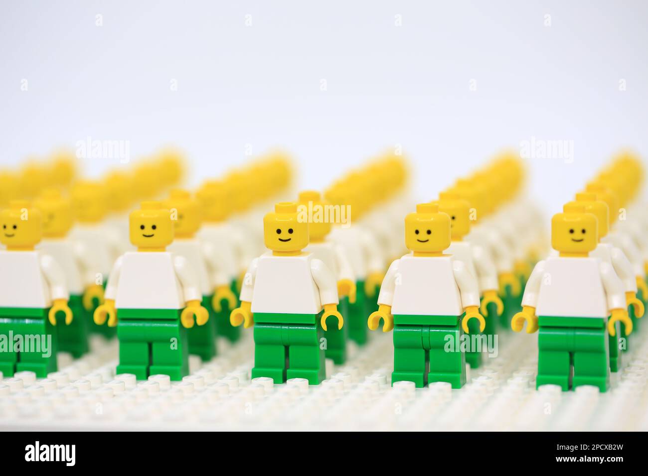 crowd of people stand together with bald head show the strong feeling ...