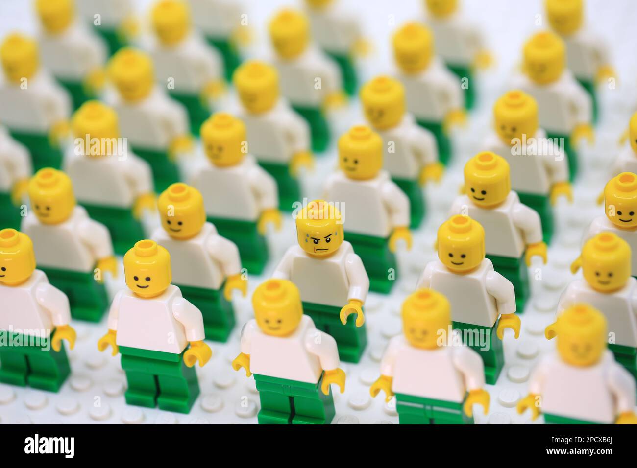 man wake up inside the crowd of bald people and want to walk out Stock ...