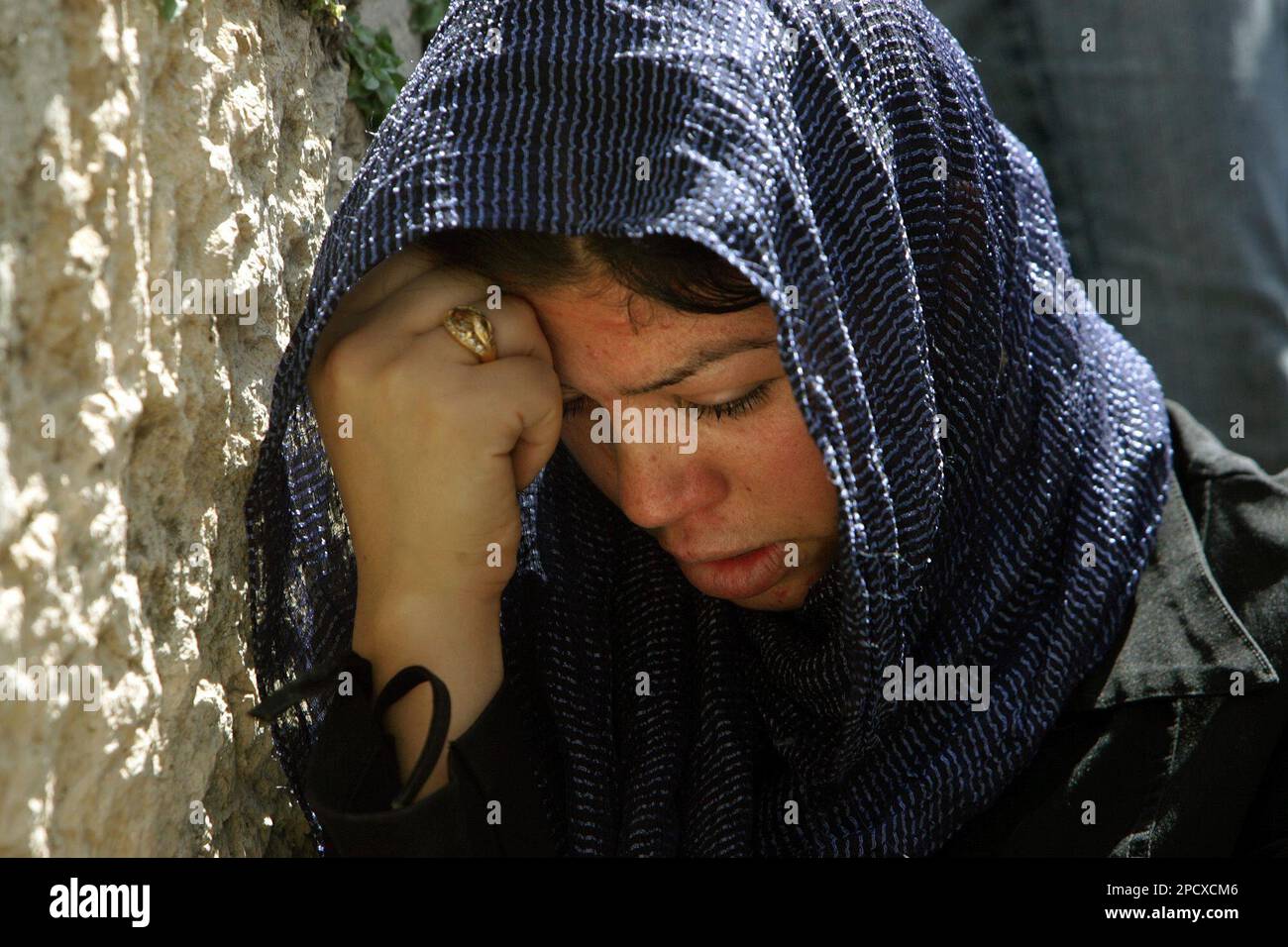 A Palestinian relative mourns during the funeral of Ayman Rateb Gabareen, a Palestinian militant ...