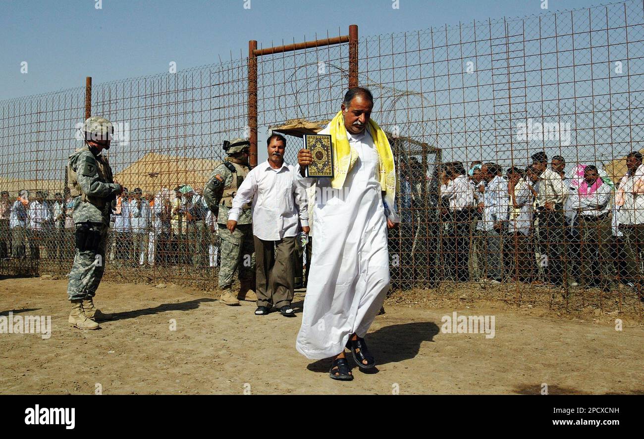 Iraqi prisoners are released at Abu Ghraib prison, west of Baghdad, in ...