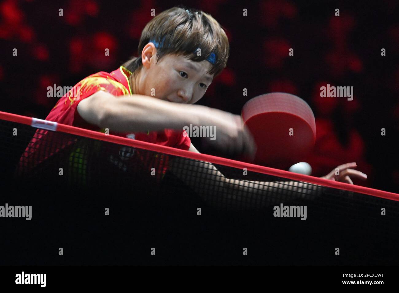 Singapore. 14th Mar, 2023. Wang Manyu of China hits a return during the ...