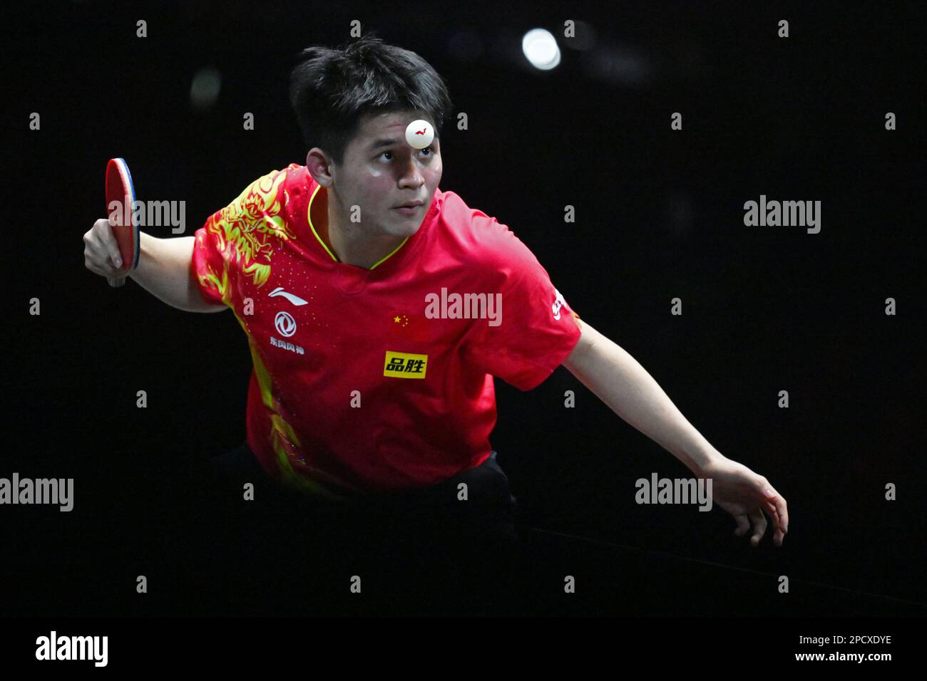 Singapore. 14th Mar, 2023. Lin Shidong of China serves during the men's ...