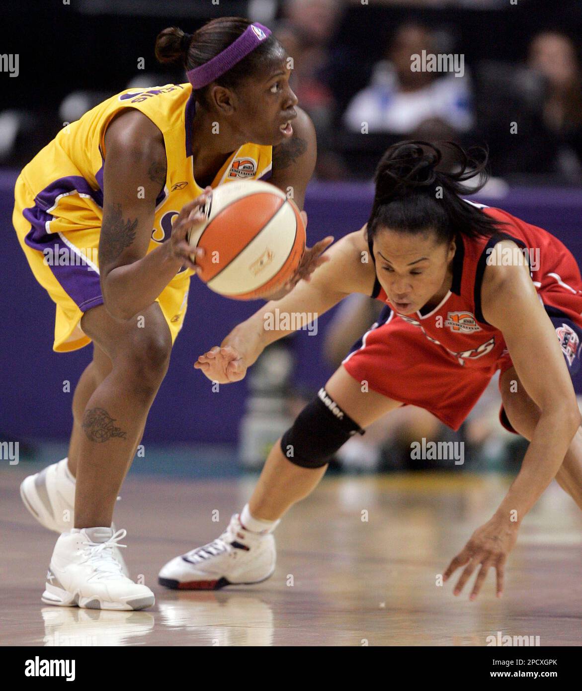 Los Angeles Sparks' Doneeka Hodges-Lewis pulls a loose ball away from ...