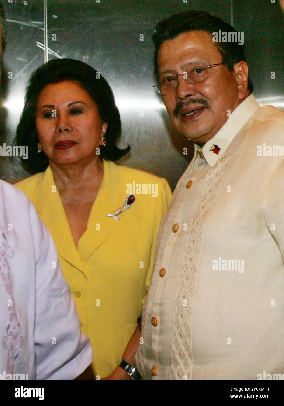Ousted President Joseph Estrada right and his wife Senator Loi Estrada ...