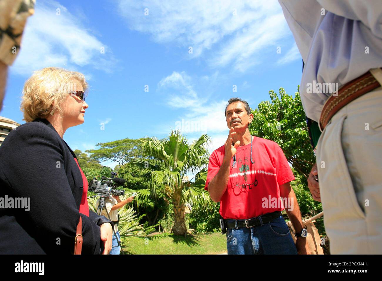 Native Hawaiian activist Walter Ritte, right, talks with University of ...